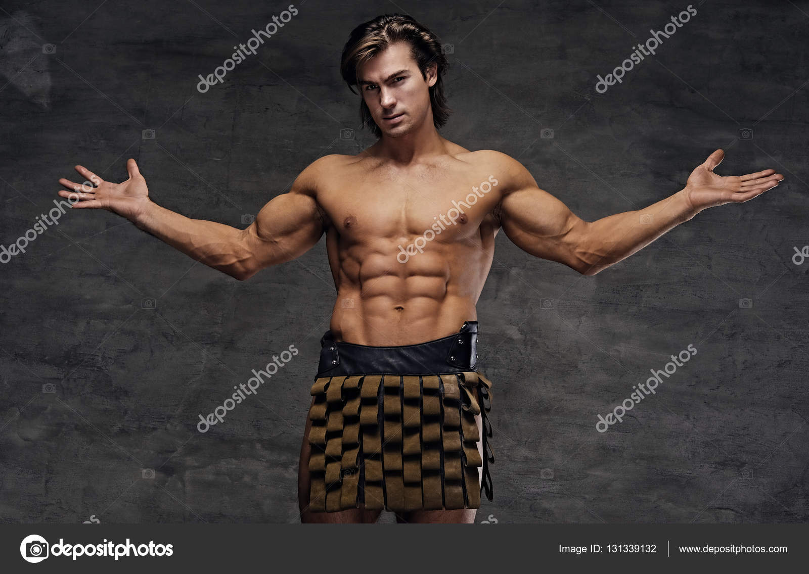Athletic man with wide opened arms Stock Photo by ©fxquadro 131339132