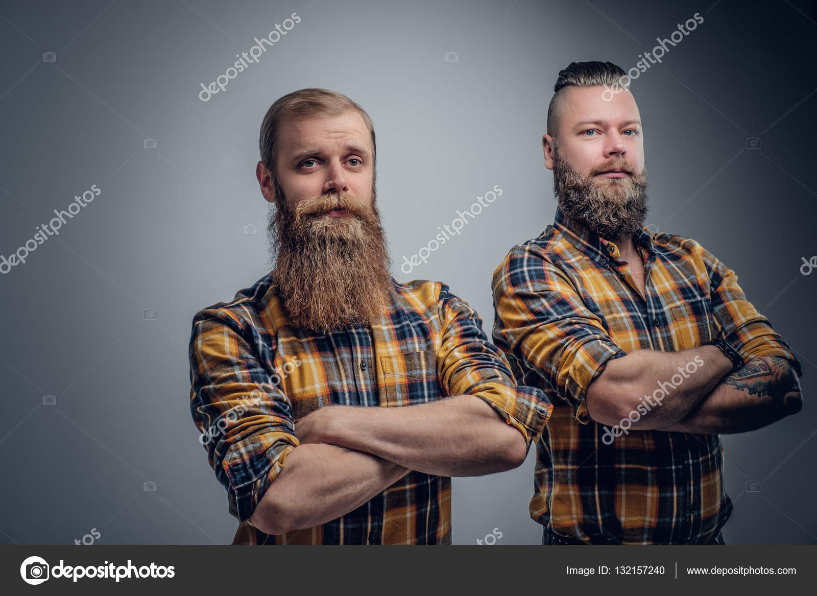 Two bearded men with crossed arms Stock Photo by ©fxquadro 132157240