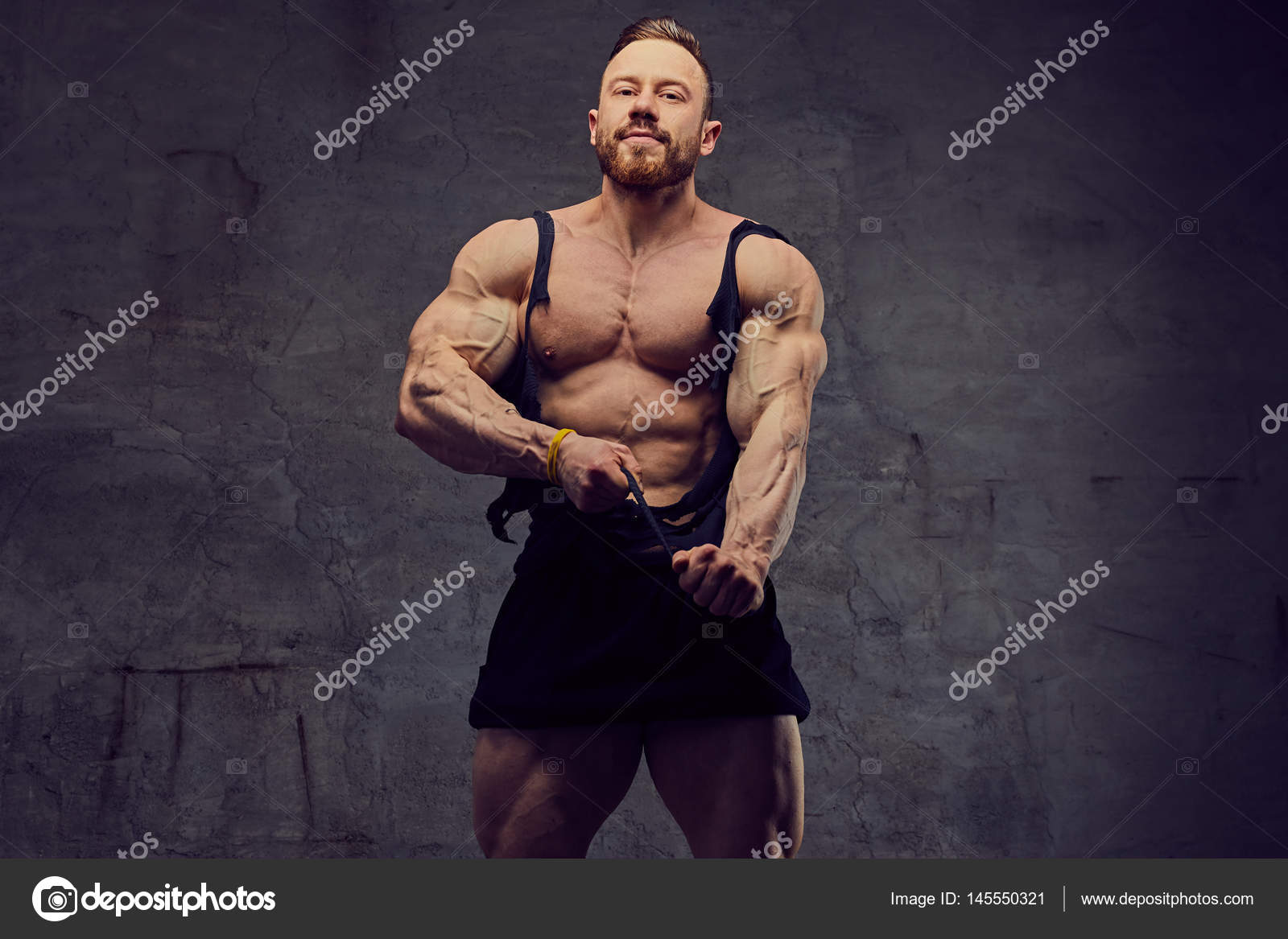 Shirtless bearded bodybuilder Stock Photo by ©fxquadro 145550321