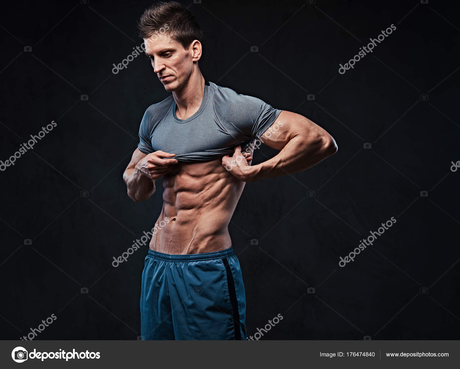 Studio Portrait Ectomorph Muscle Shirtless Male Takes Shirt Shows ...
