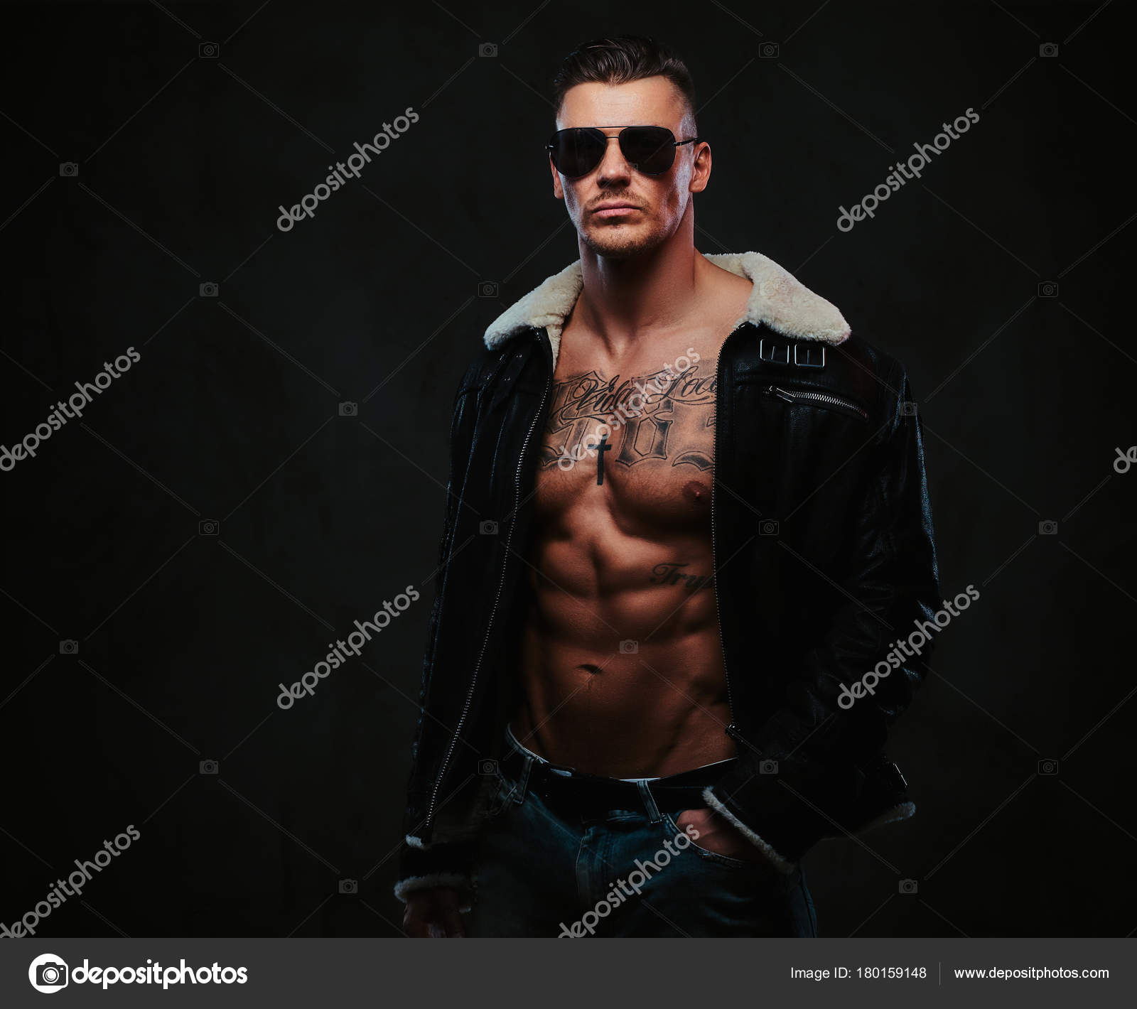 A macho stylish man on a dark background. Stock Photo by ©fxquadro ...
