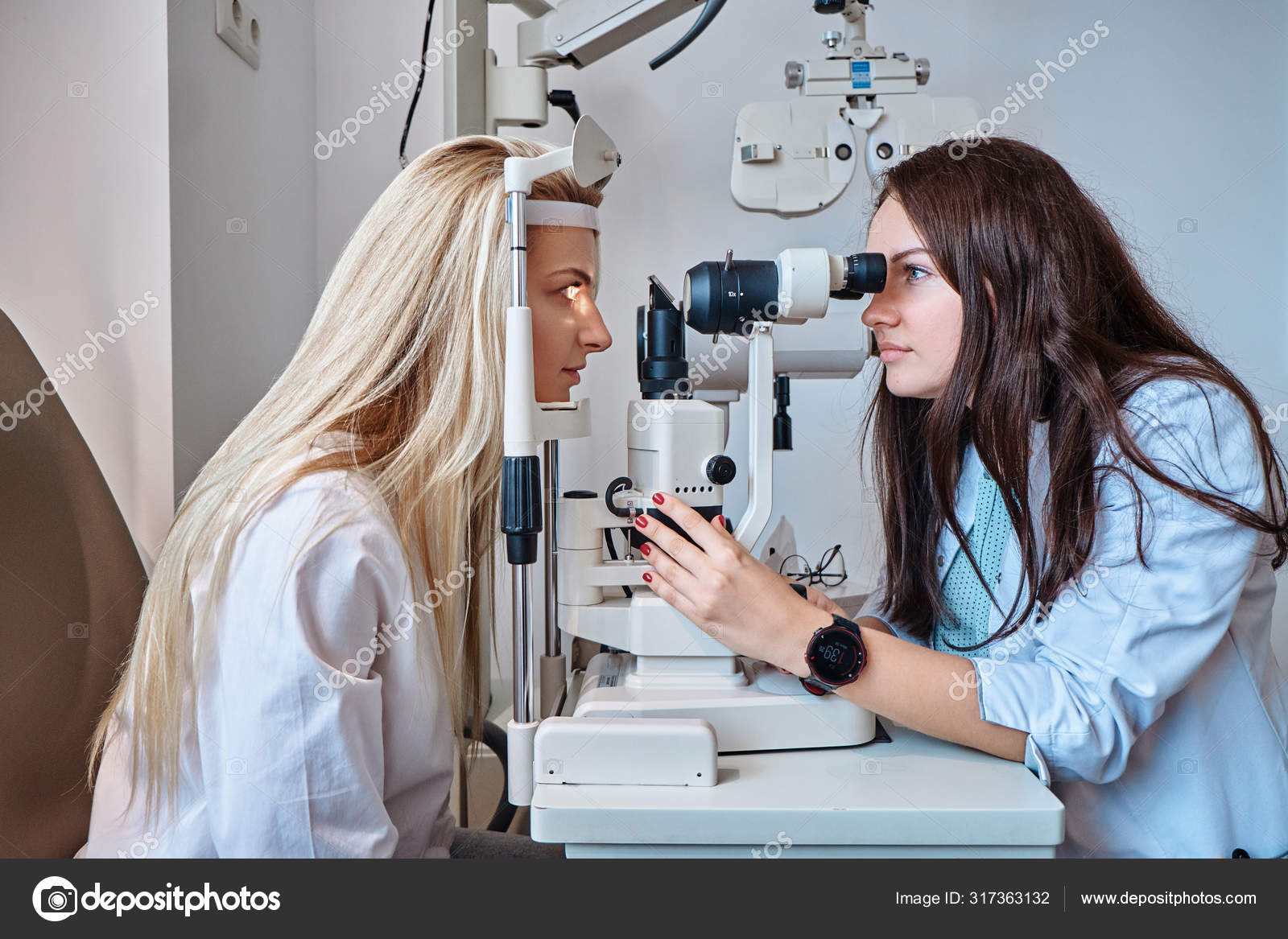 Woman Is checking her sight at optician cabinet Stock Photo by ...
