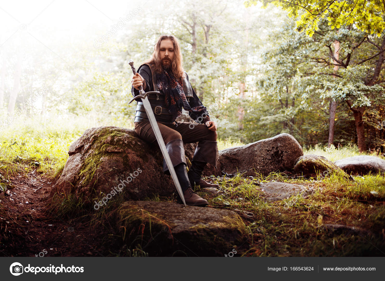 Knight on the road. A guy in a medieval costume with a sword — Stock ...