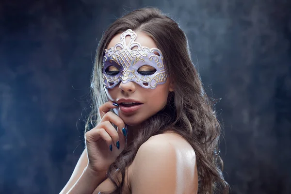 The beautiful young girl in a mask — Stock Photo © heckmannoleg #2834062