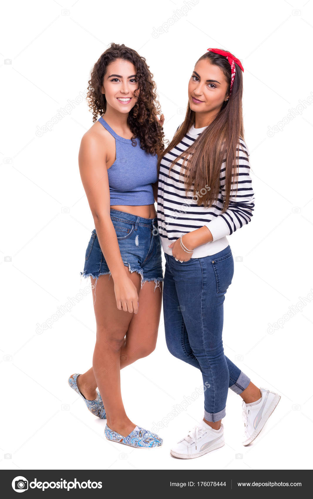 Two friends posing in studio Stock Photo by ©hsfelix 176078444