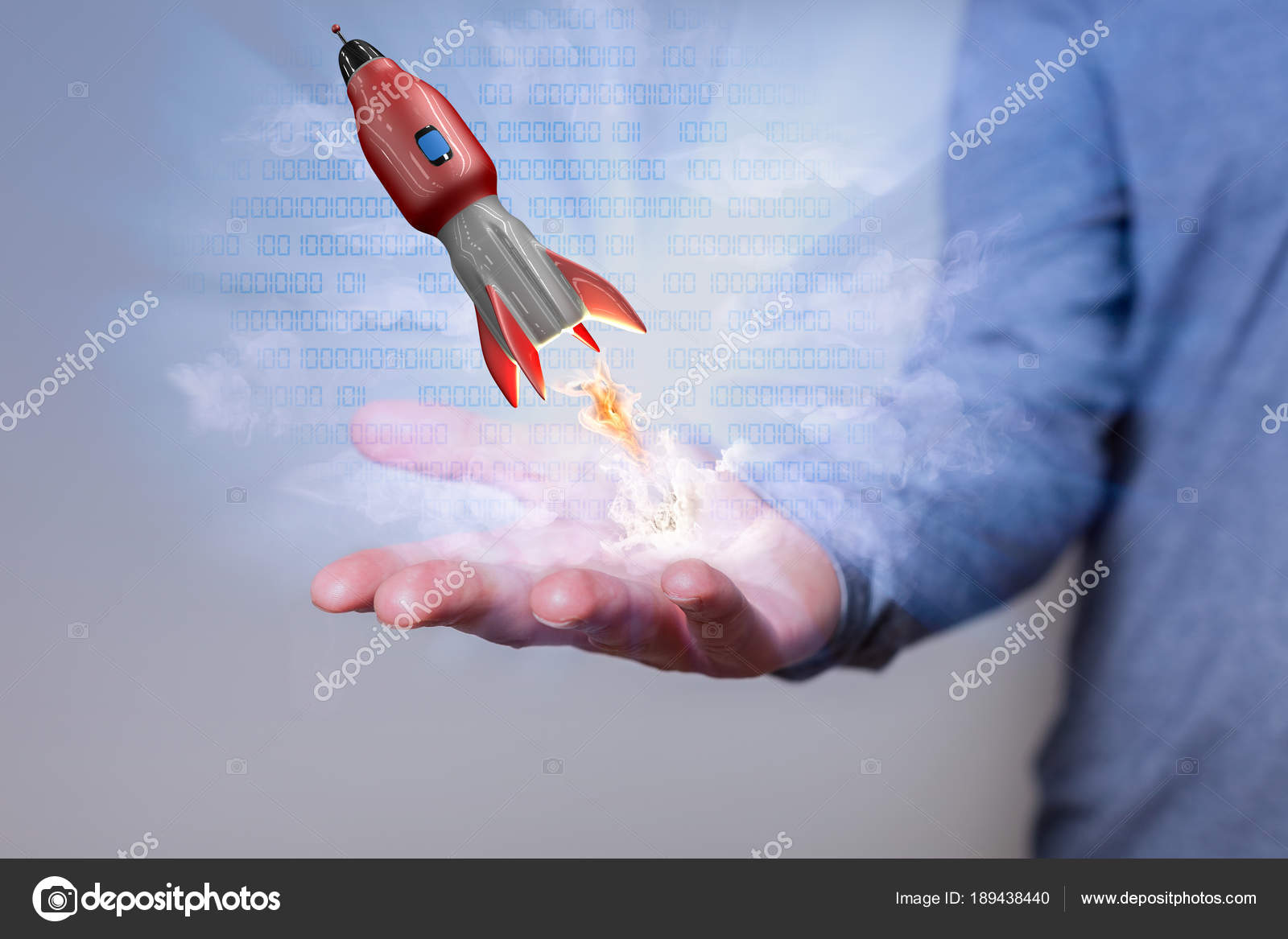 Mans Hand Bits Starting Rocket Stock Photo by ©limbi007 189438440