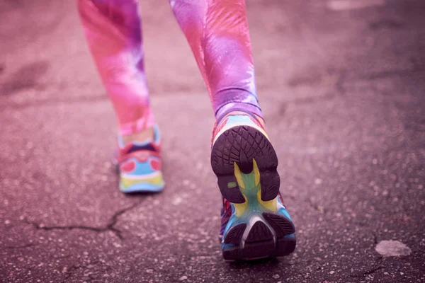 Runner feet running on road closeup on shoes. - Stock Image - Everypixel