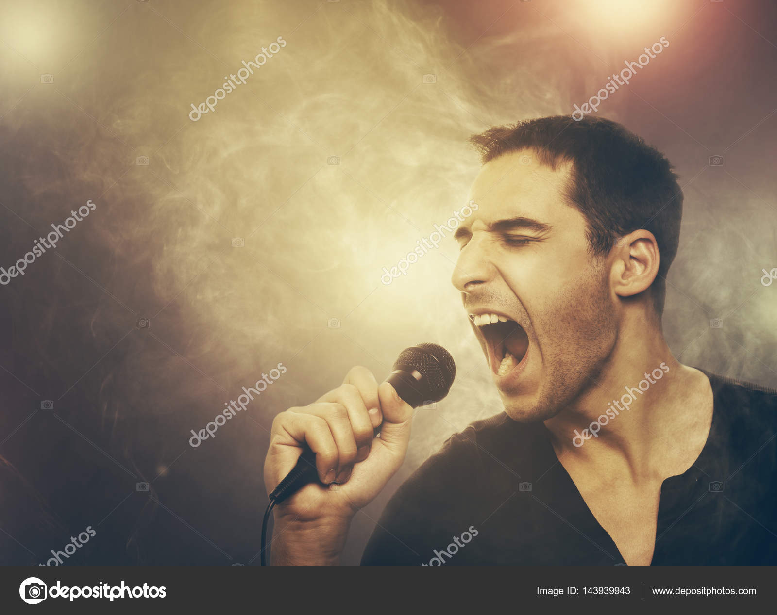 Young man singing rock Stock Photo by ©hitdelight 143939943