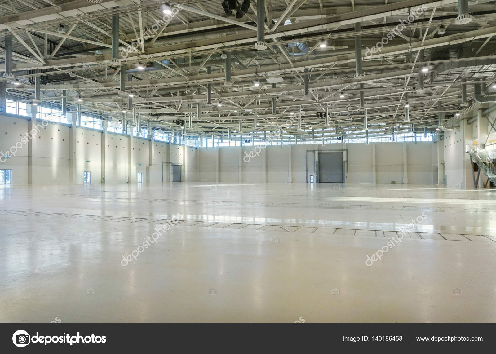Large empty space in hangar Stock Photo by ©cadovnik 140186458