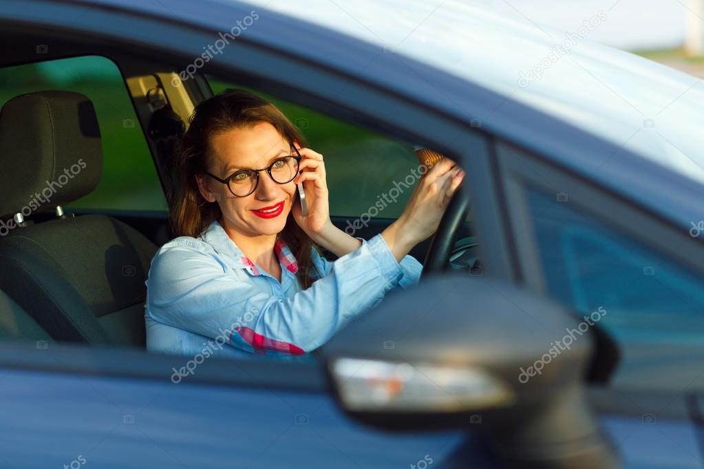 Businesswoman multitasking while driving — Stock Photo © vlad_star ...