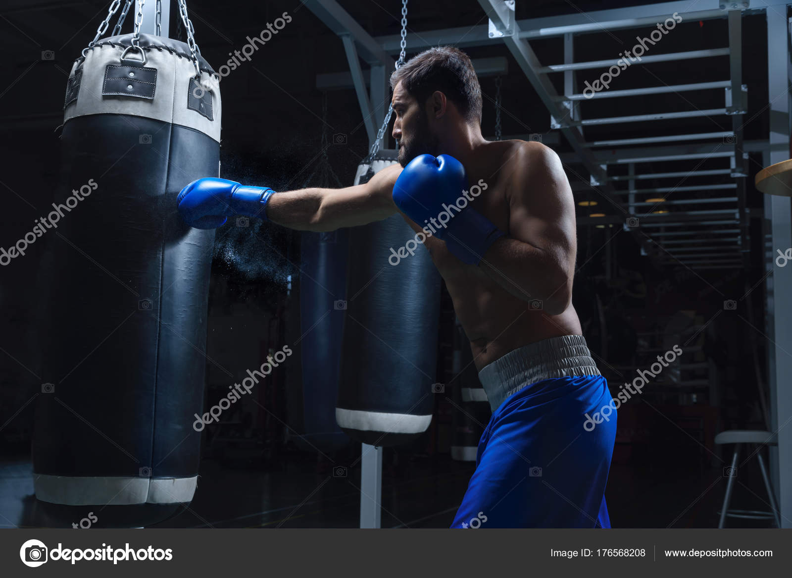 Man in a boxing ring Stock Photo by ©Deklofenak 176568208