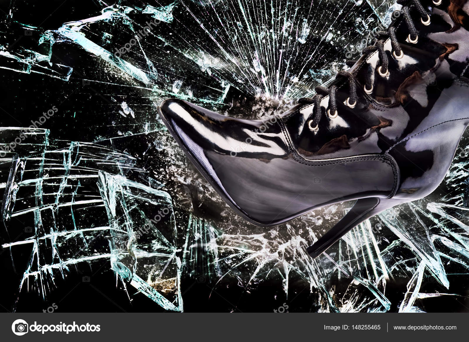 Stomping throught a glass window. Stock Photo by ©mj0007 148255465