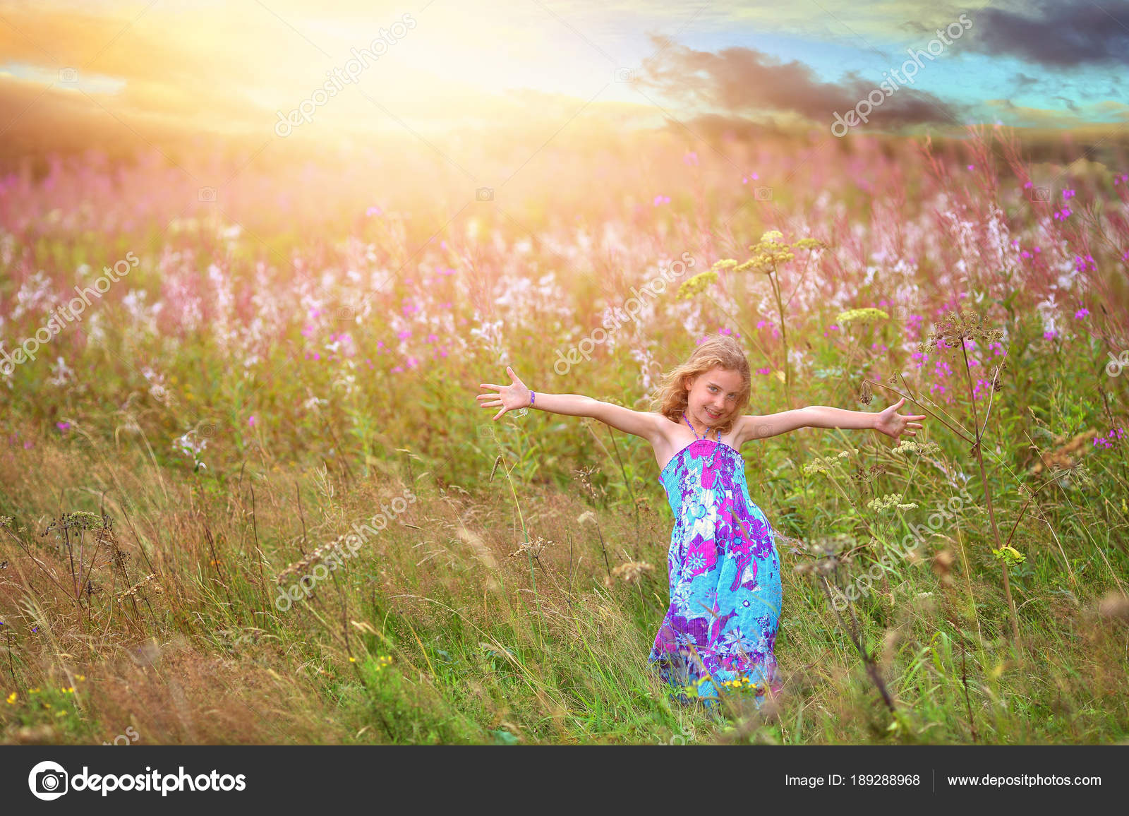 Girl Dancing In Field Of Flowers