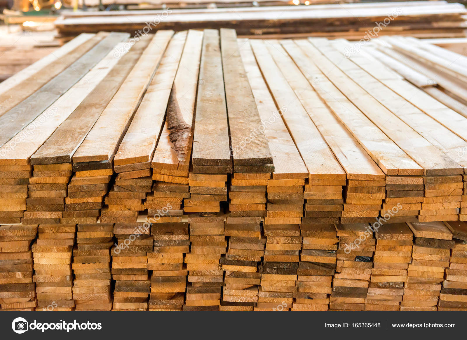 Planks in timber factory Stock Photo by ©dovapi 165365448