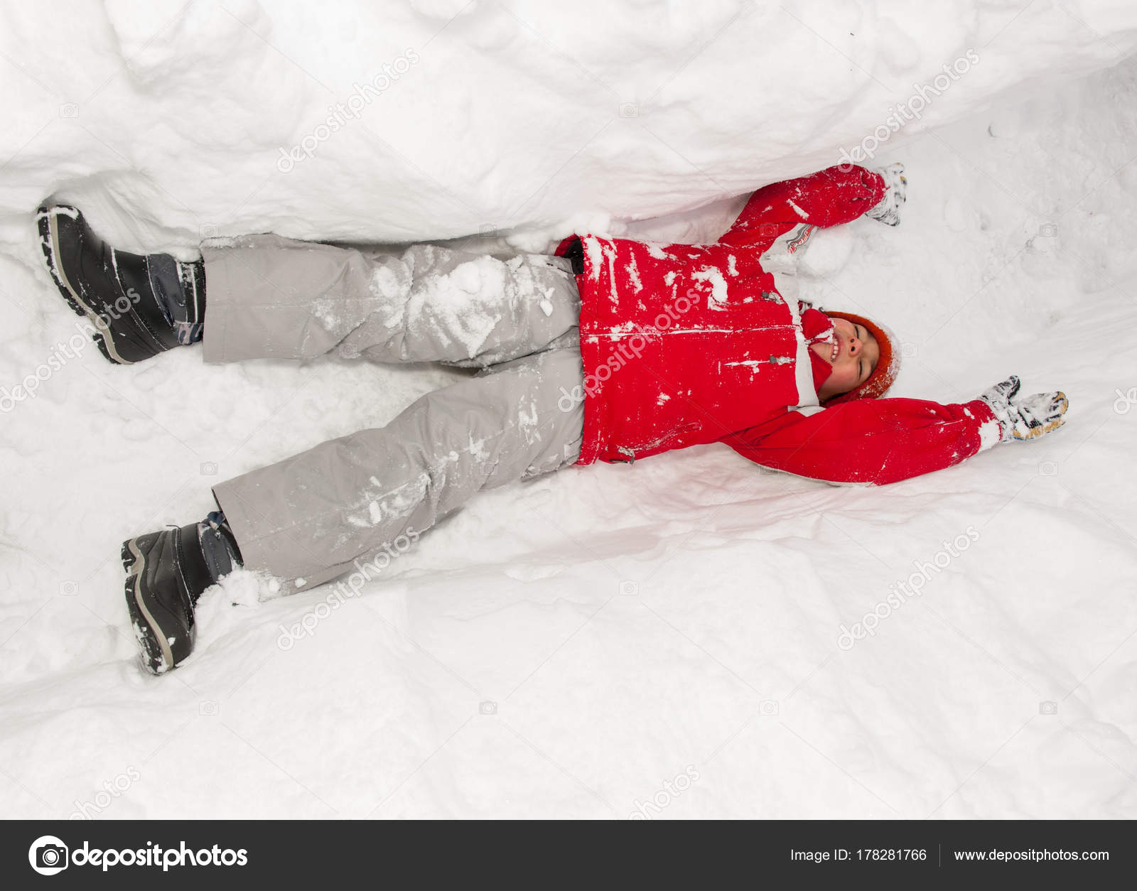 Boy Playing Really Big Snow Stock Photo by ©zurijeta 178281766