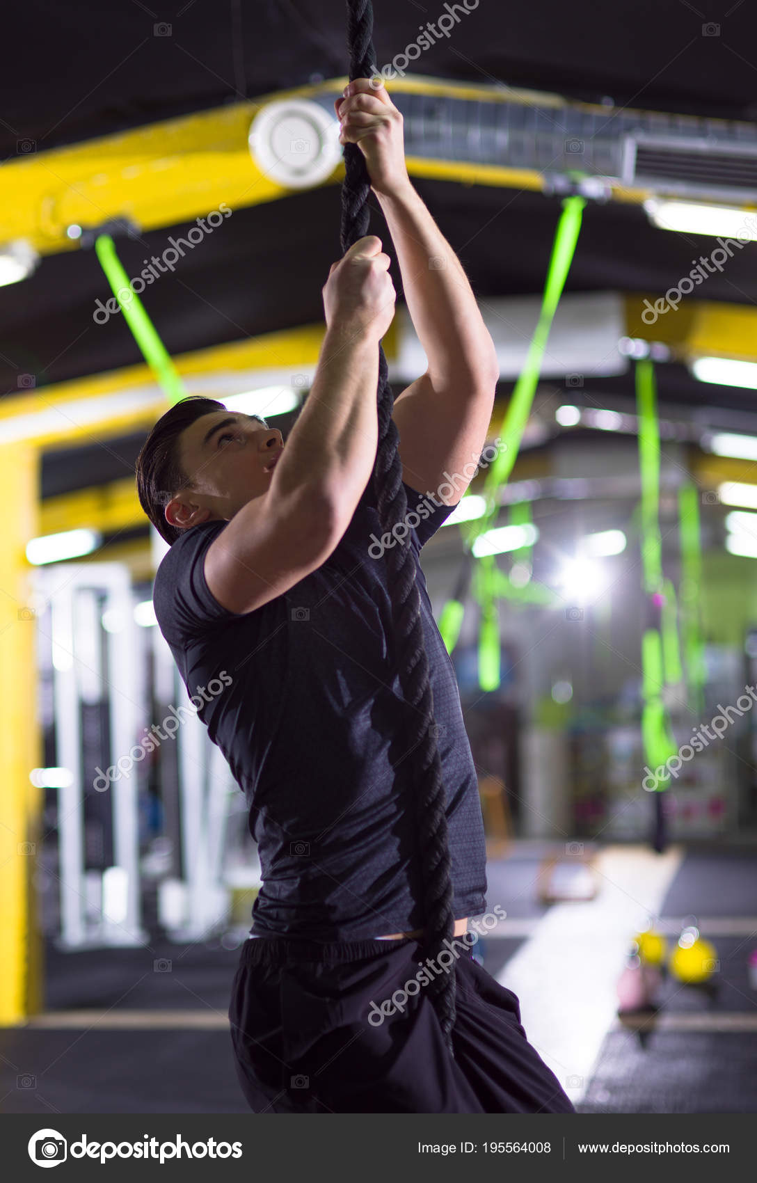 Young Muscular Man Doing Rope Climbing Crossfitness Gym Stock Photo by ...