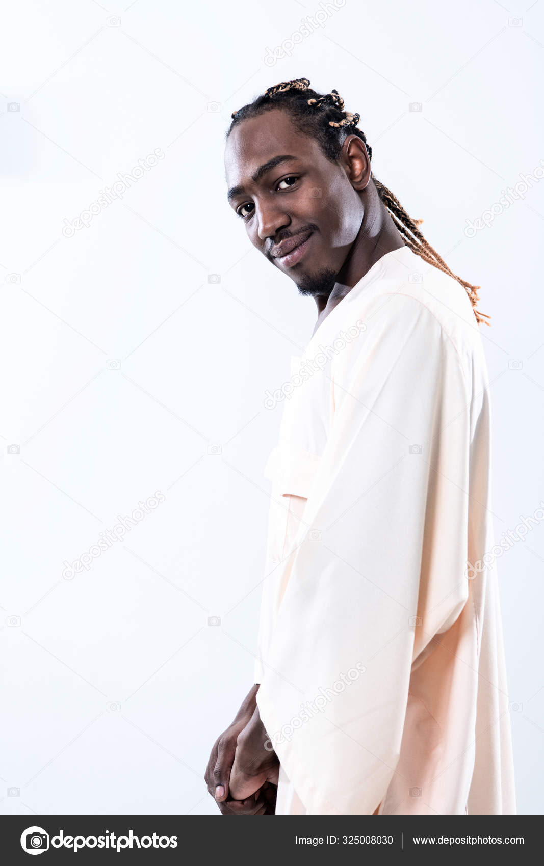 Handsome african black man in traditional clothes — Stock Photo © .shock #325008030