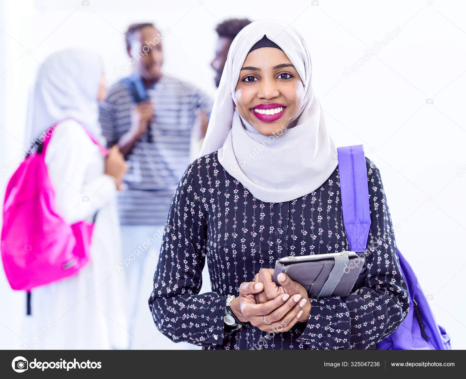 Muslim female student with group of friends — Stock Photo © .shock ...