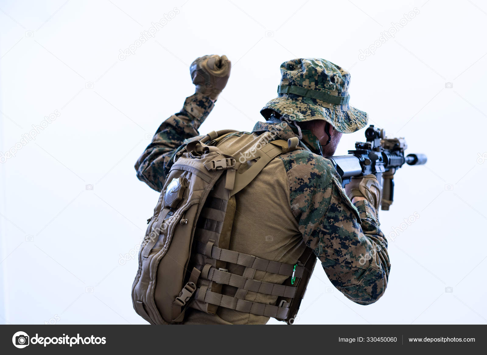 Soldier in action giving comands to team by hand sign Stock Photo by ...