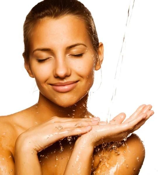 Woman face with water drop Stock Photo by ©kanareva 151885210