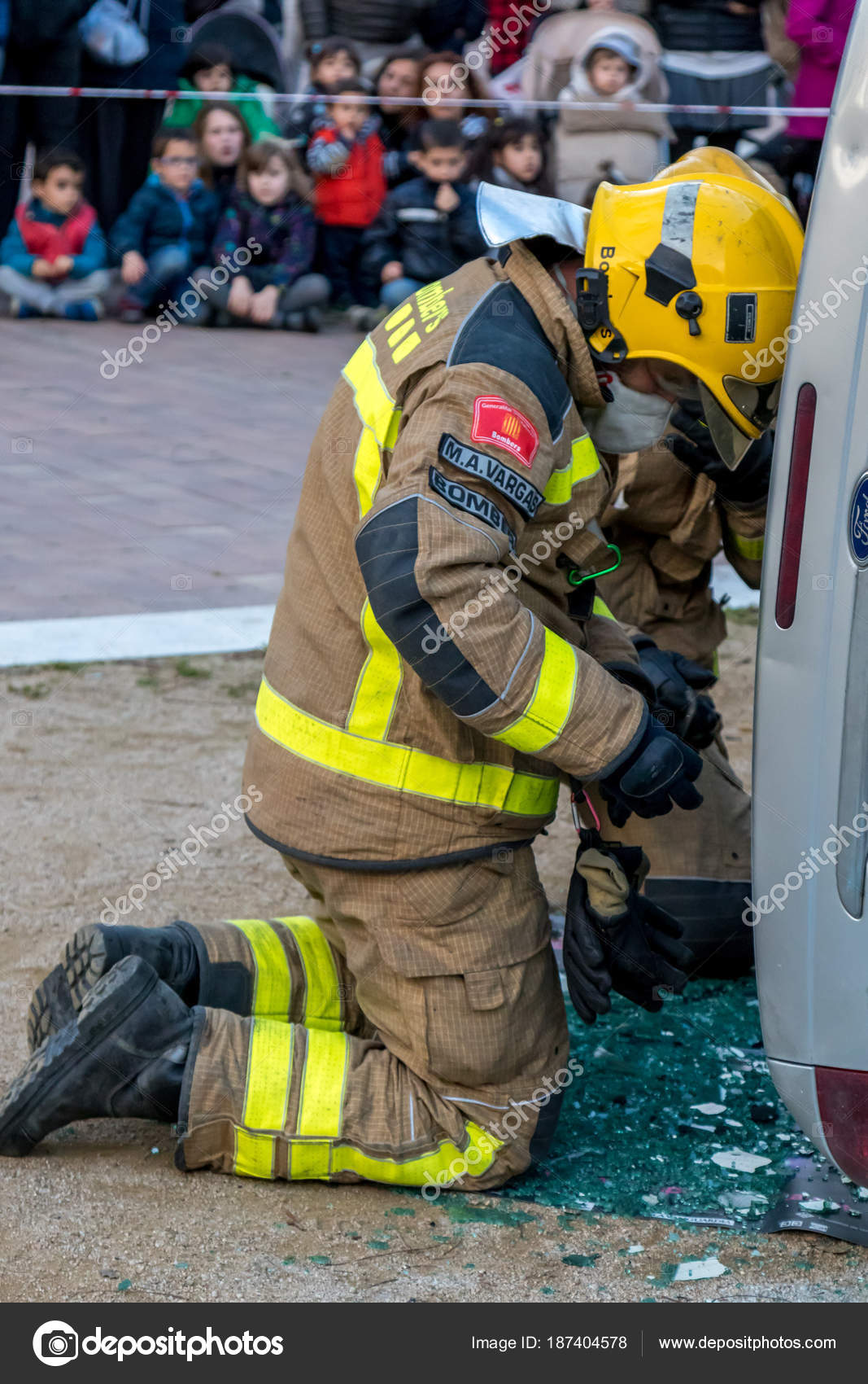 Fireman s exhibition on village Palamos. Imitated car accident, with ...