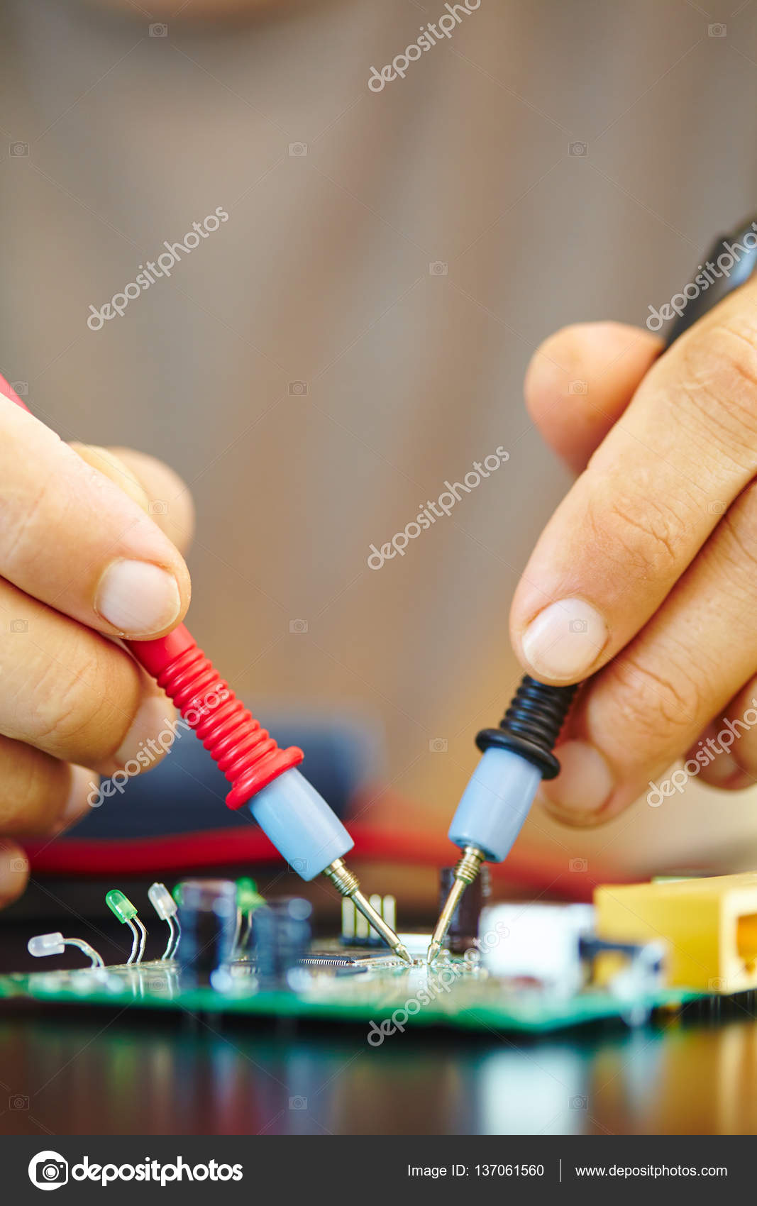 Hands holding electronic laboratory Stock Photo by ©strelok 137061560