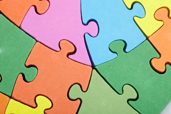 Bright Colorful Puzzle Pieces Close — Stock Photo © strelok #249889446