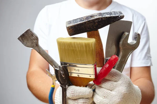 Man holding tools — Stock Photo © strelok #138485834