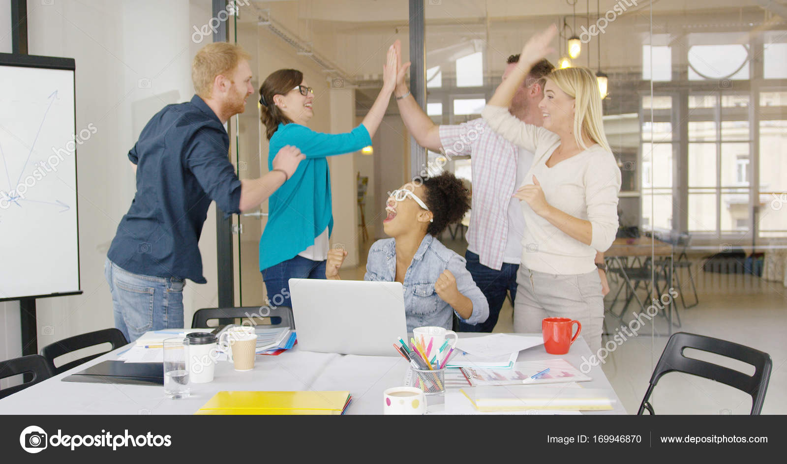 Workers giving high five — Stock Photo © dashek #169946870