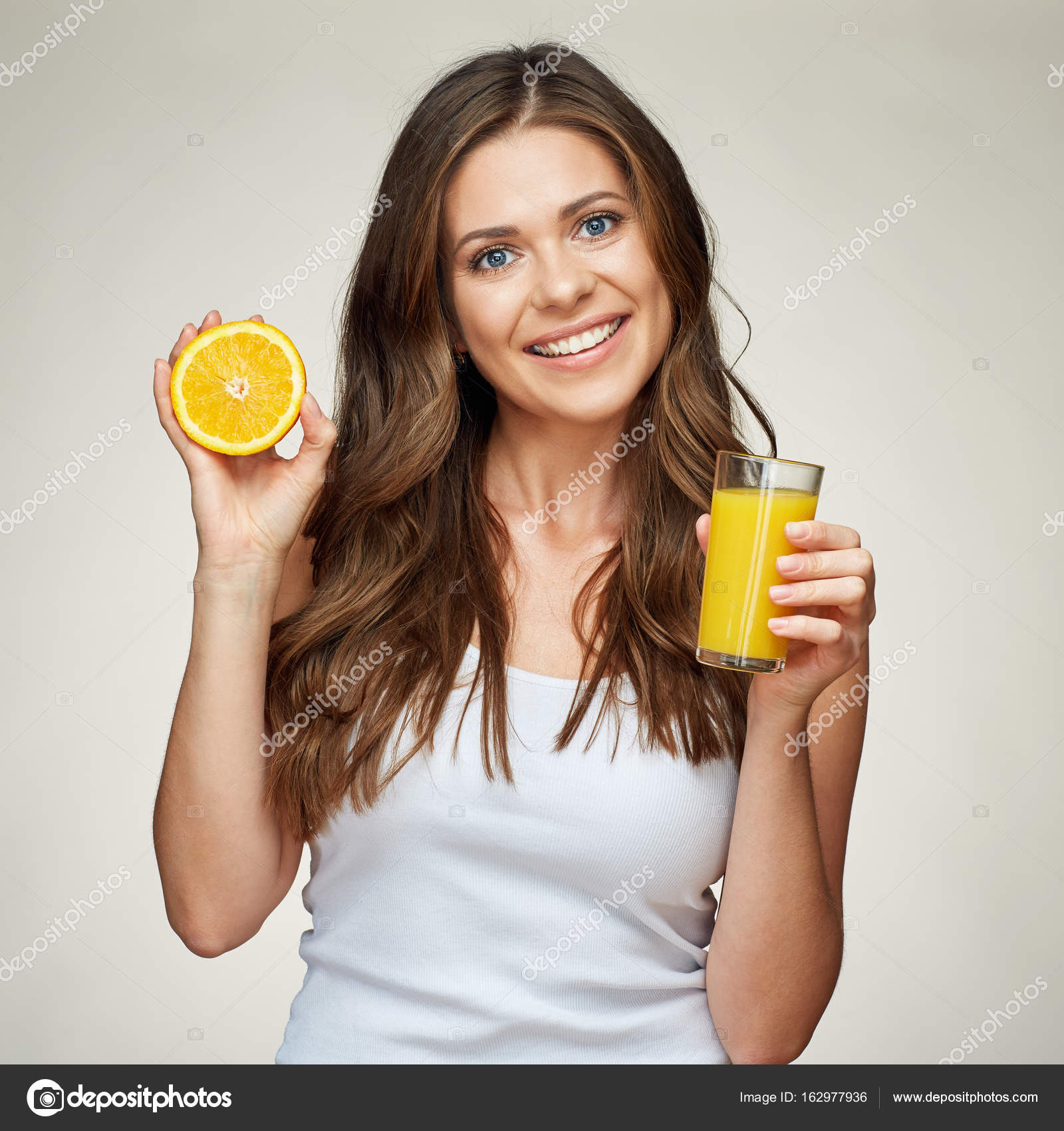 Half Glass Of Orange Juice