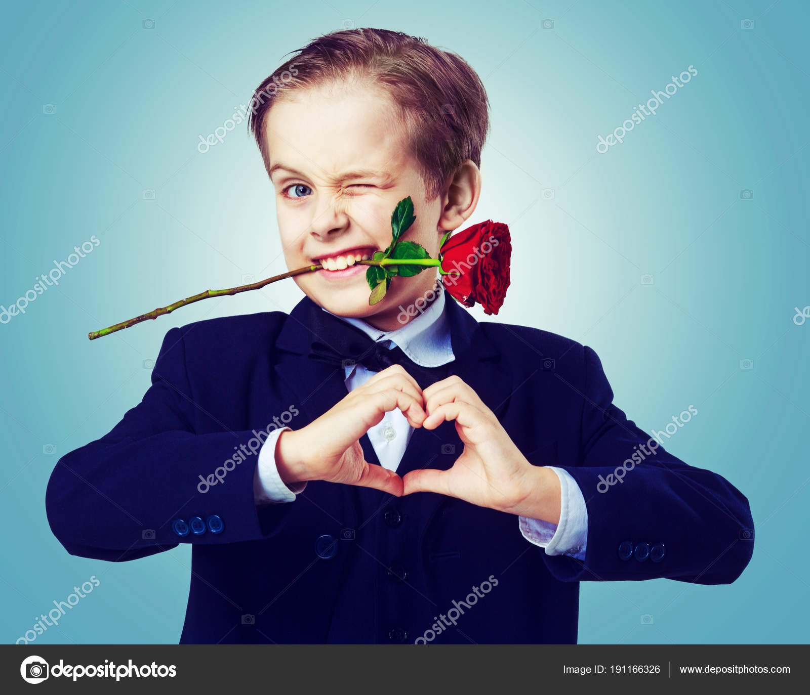 Cute boy with a rose Stock Photo by ©Photolin 191166326