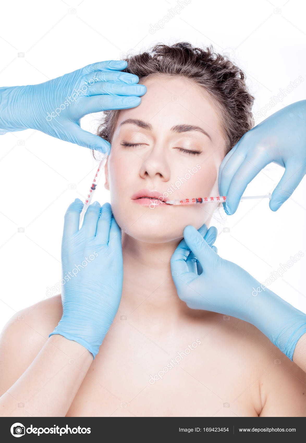Woman having face injections Stock Photo by ©Photocreo 169423454