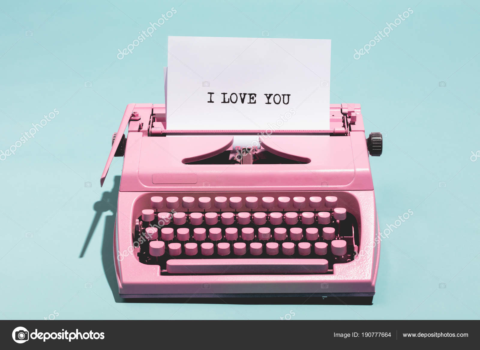 Pink Typewriter With Paper