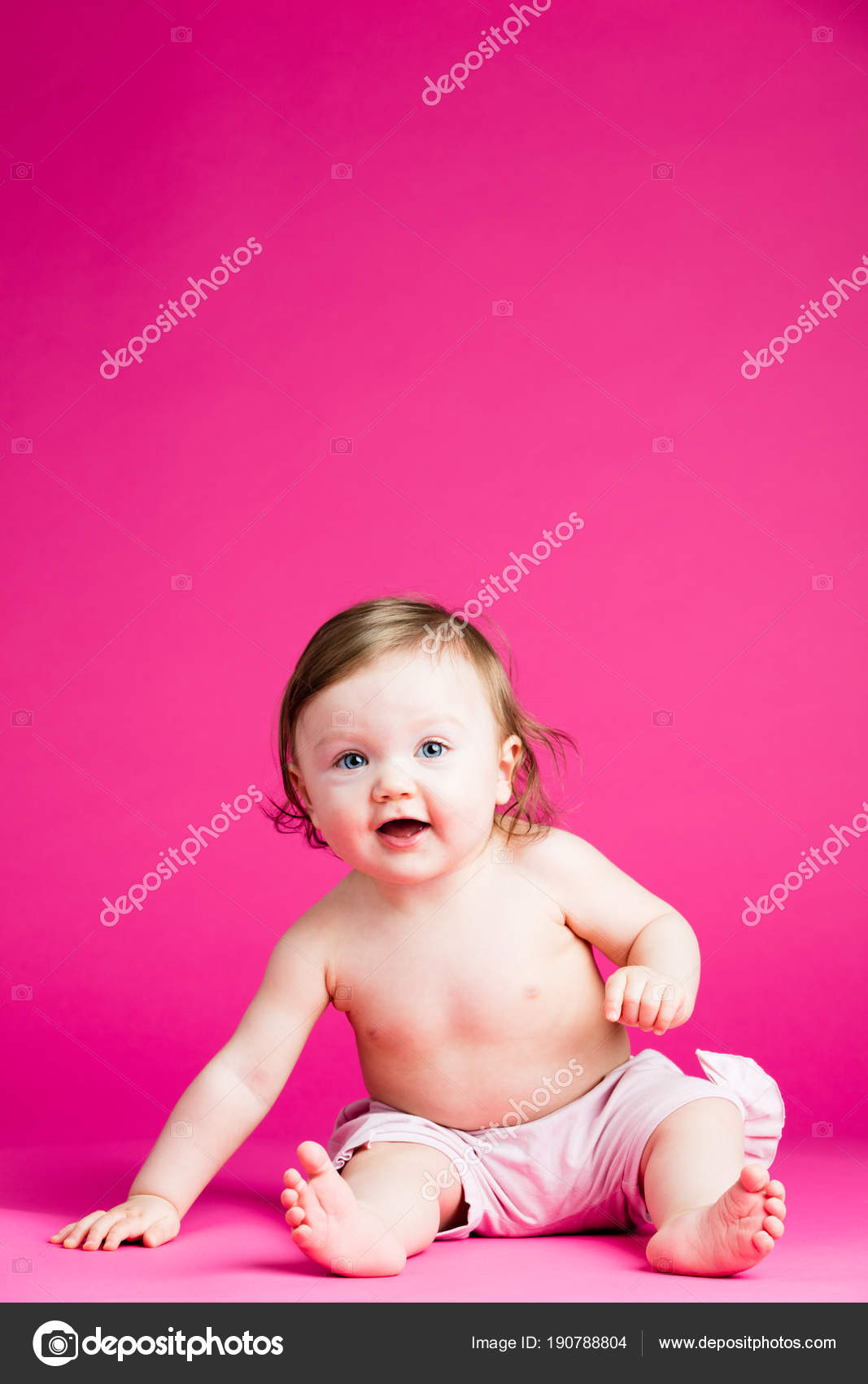 Toddler Sitting Floor Pink Background Stock Photo by ©Photocreo 190788804
