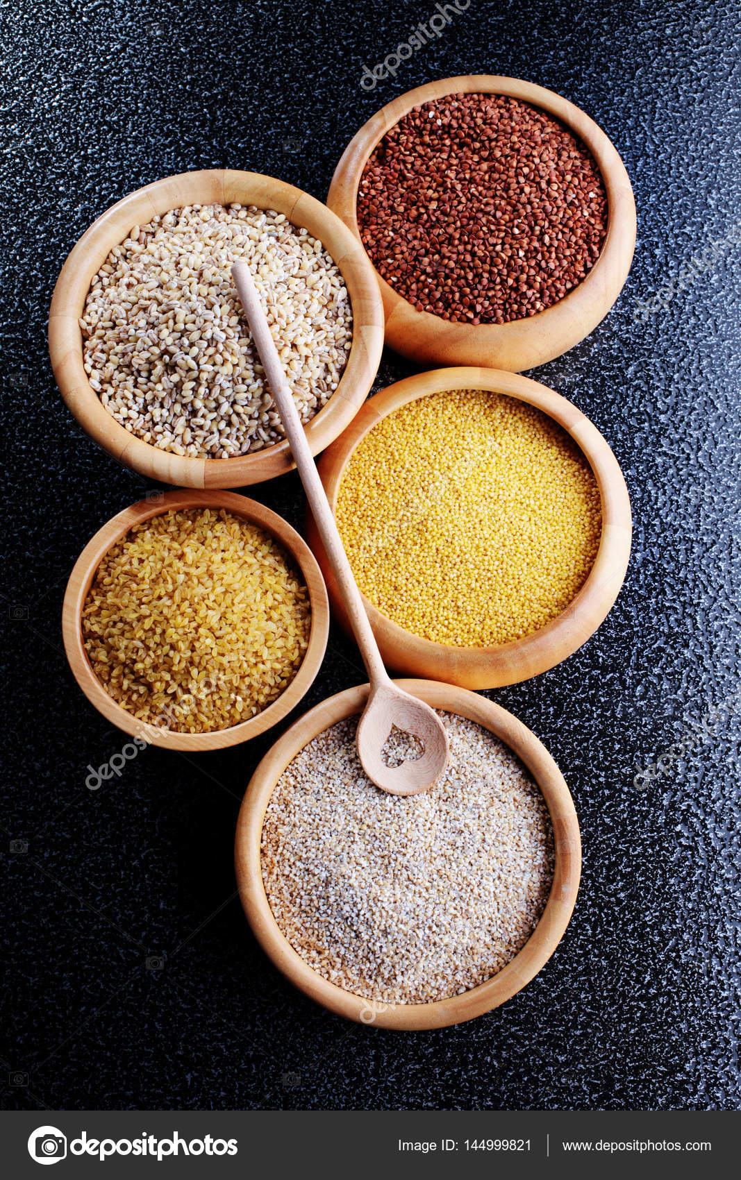 Various groats in bowls — Stock Photo © matka_Wariatka #144999821