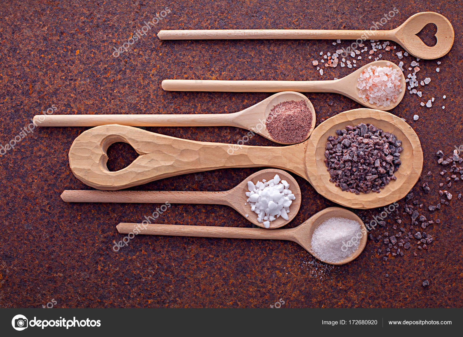 Various salt in wooden spoons Stock Photo by ©matka_Wariatka 172680920