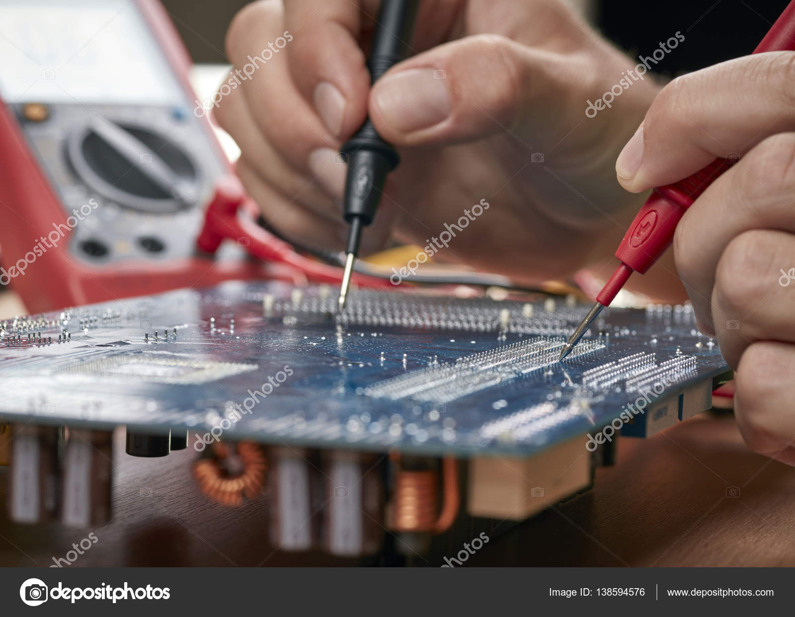 Technician checking motherboard with tester. — Stock Photo © silverjohn ...