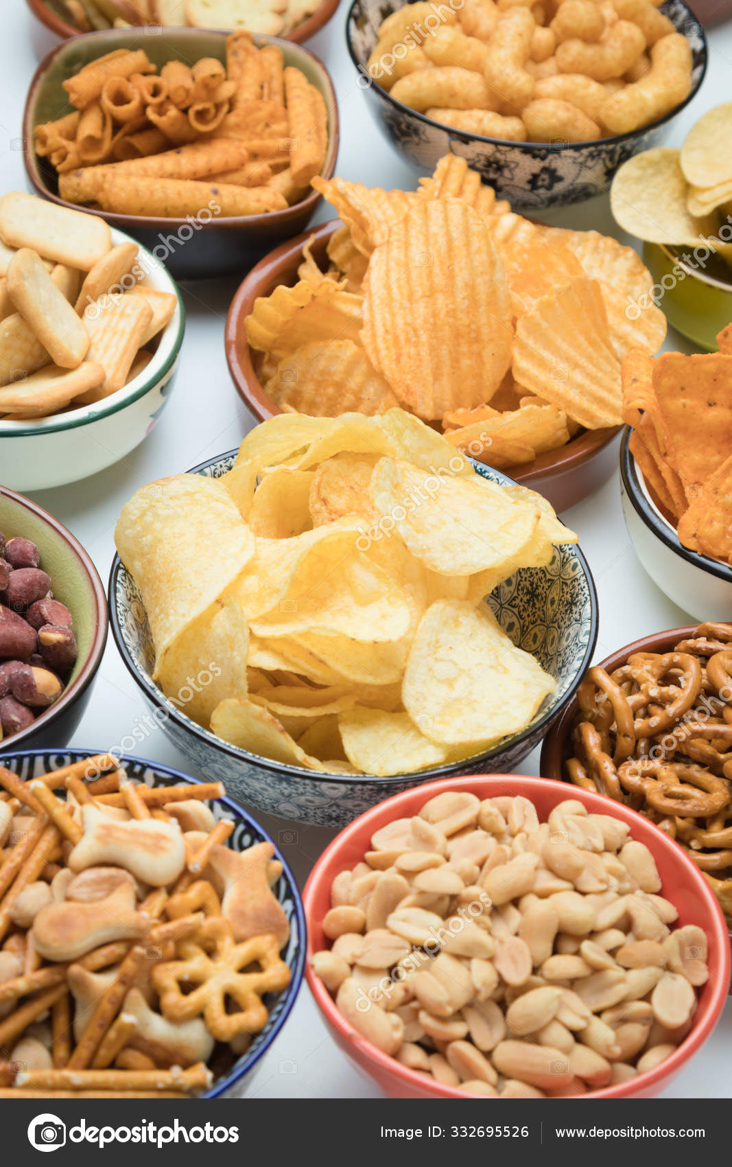 Salty snacks served as party food — Stock Photo © igordutina #332695526