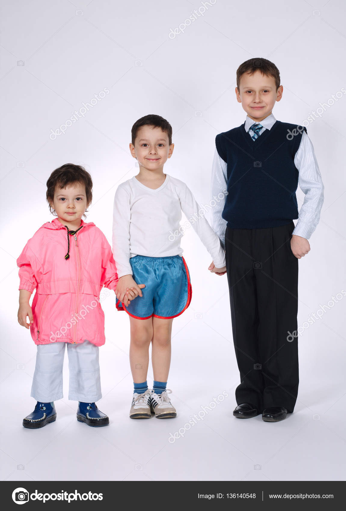 Three boys on white background Stock Photo by ©ababaka 136140548
