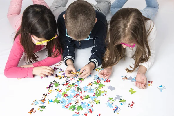 Kids puzzle Stock Photos, Royalty Free Kids puzzle Images | Depositphotos