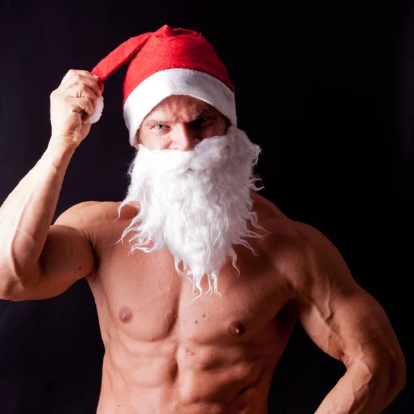 Muscular santa claus Stock Photo by ©csakisti 132495120