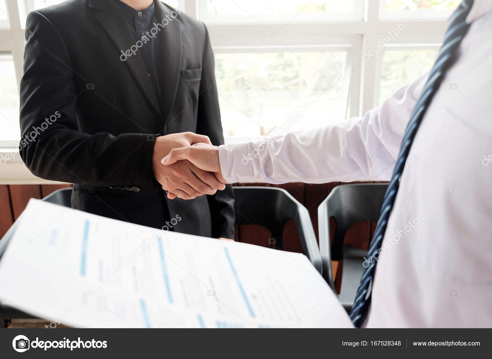 Job applicant having interview. Handshake success job interviewi ...