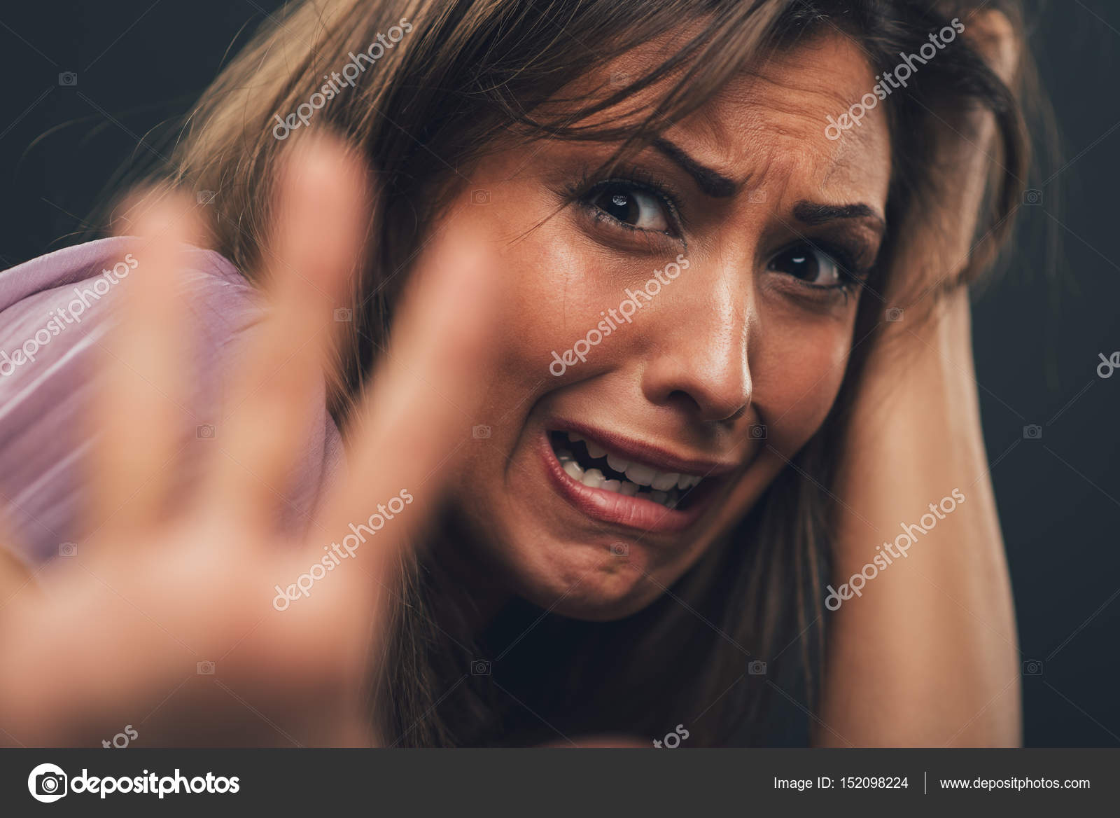 Abused woman defending with pray — Stock Photo © MilanMarkovic #152098224