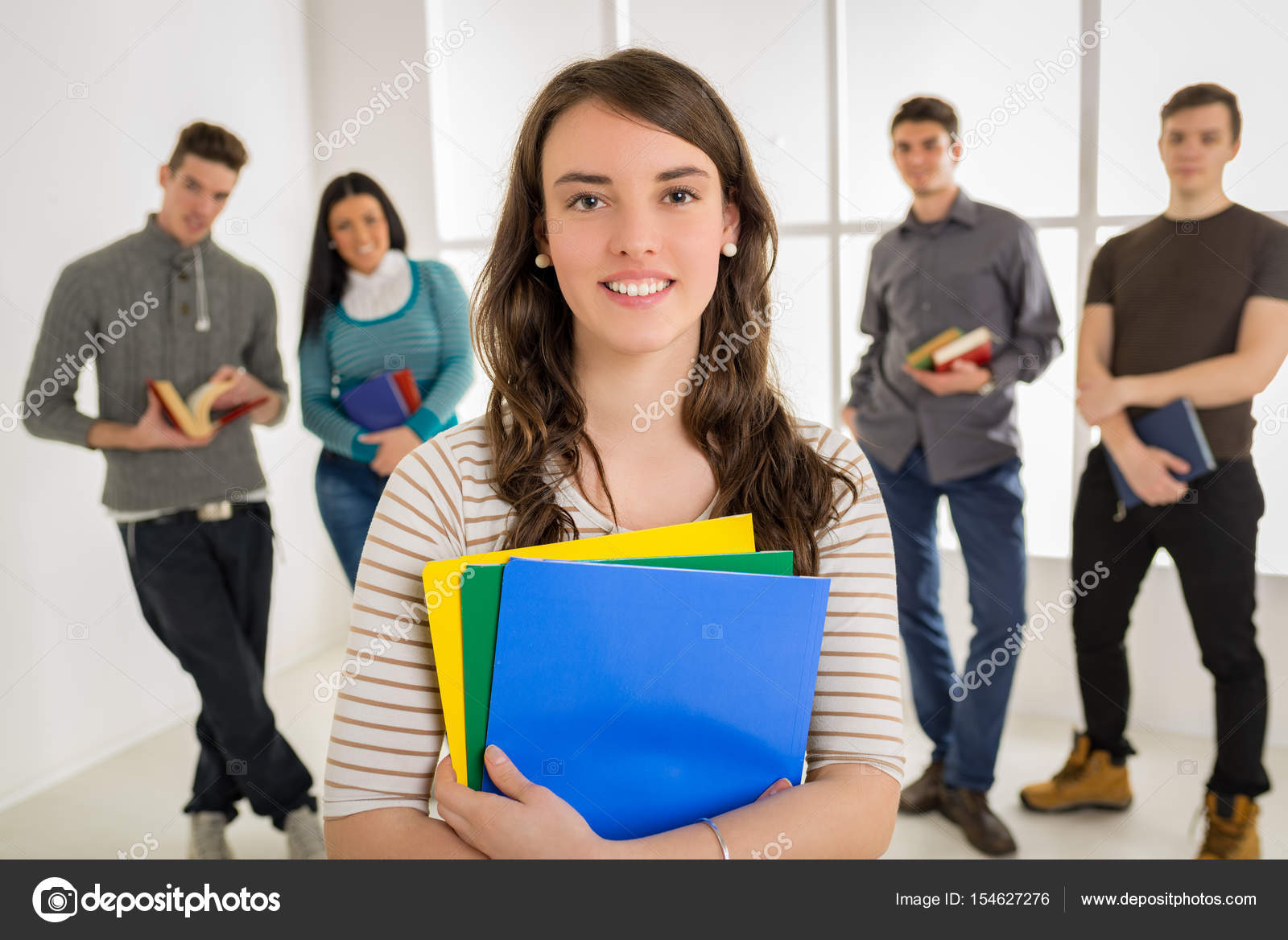 Beautiful young students Stock Photo by ©MilanMarkovic 154627276