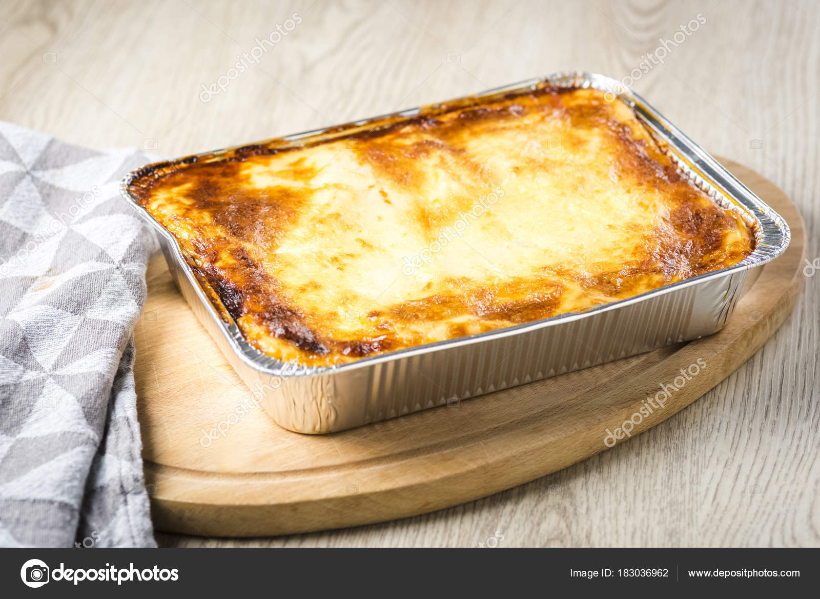 A portion of lasagna straight from the oven Stock Photo by ©rlat28 ...
