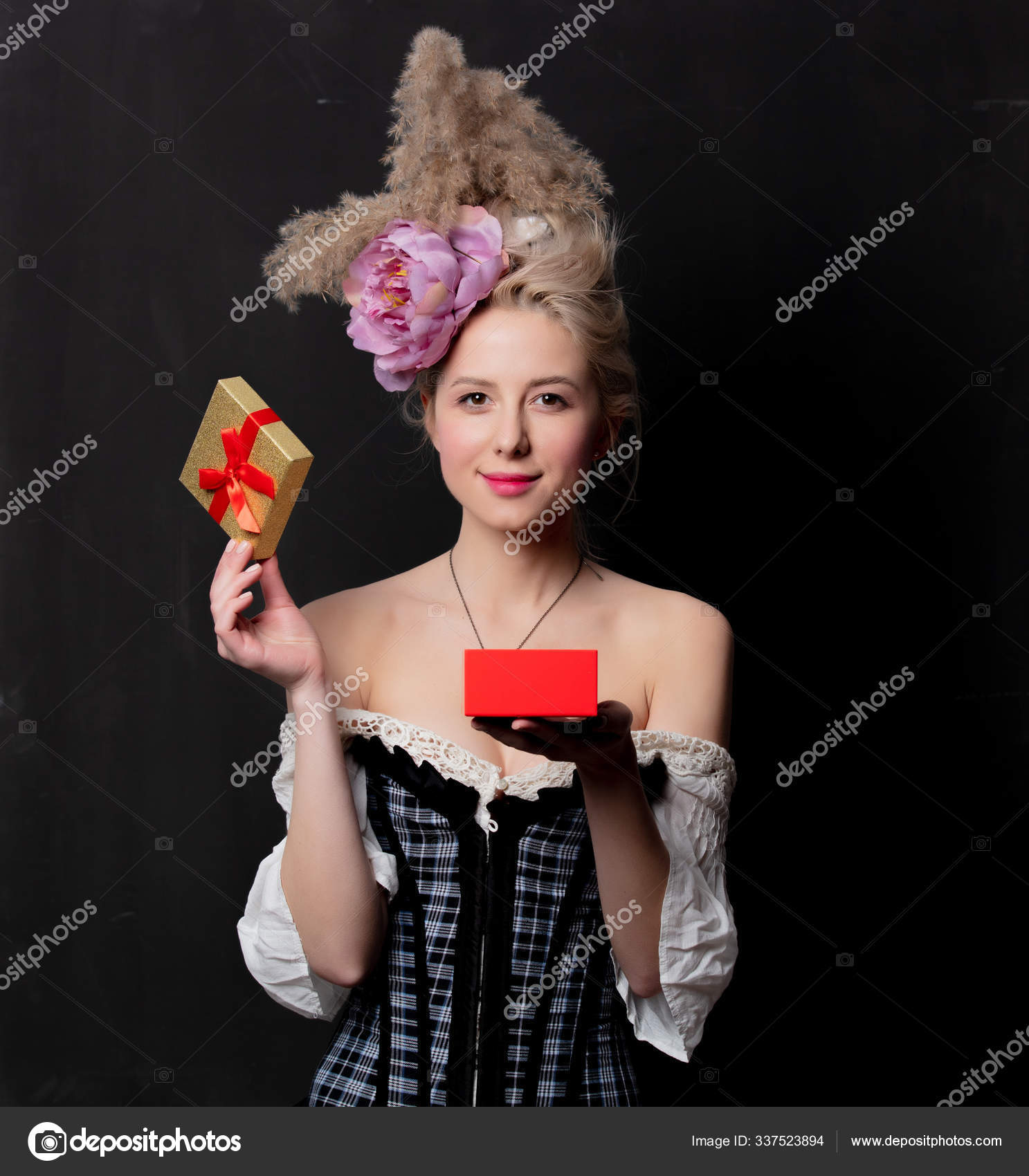 Beautiful blonde countess with a gift box Stock Photo by ...
