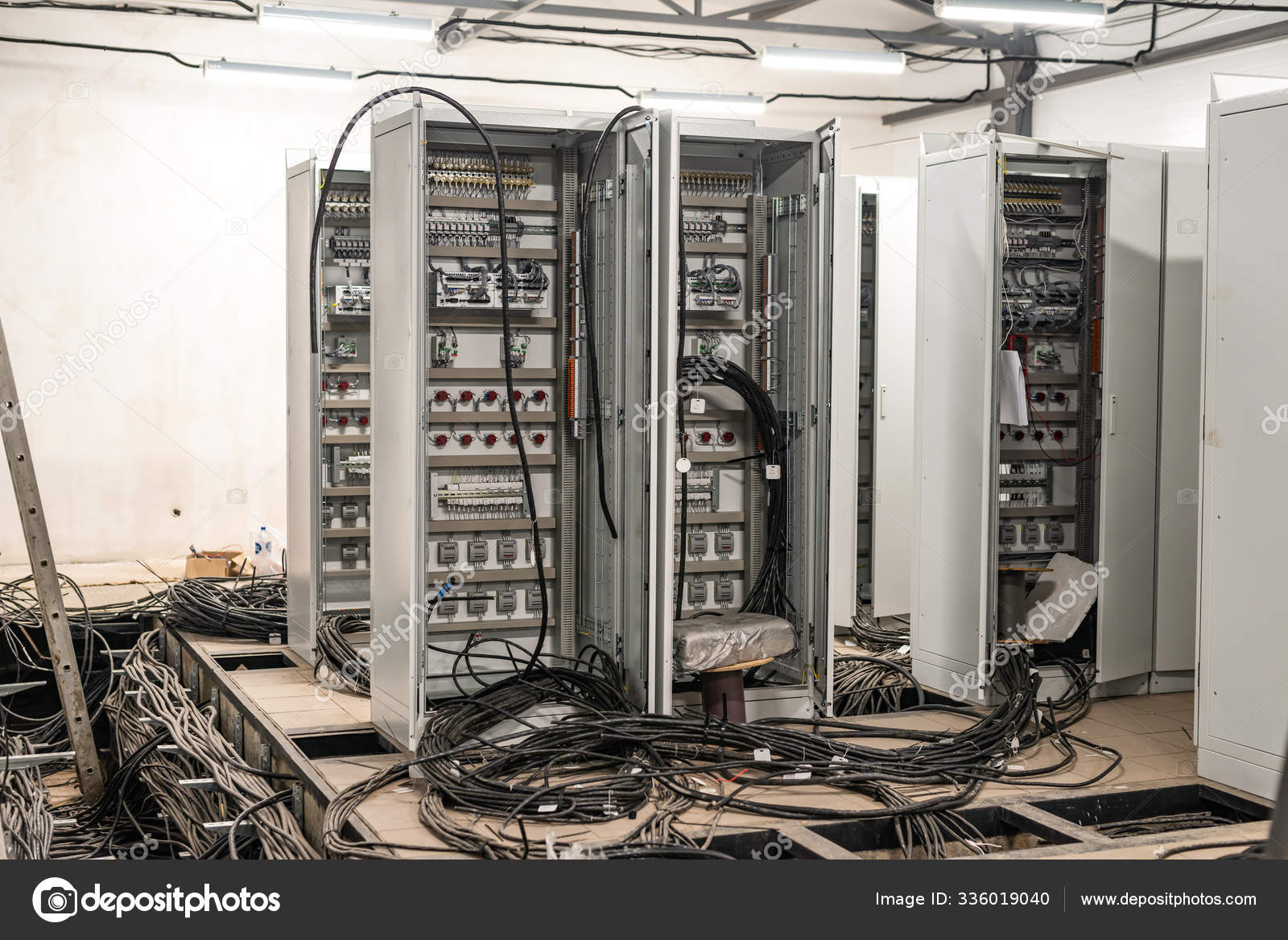 Relay hall with a variety of wires in the process of installatio Stock ...