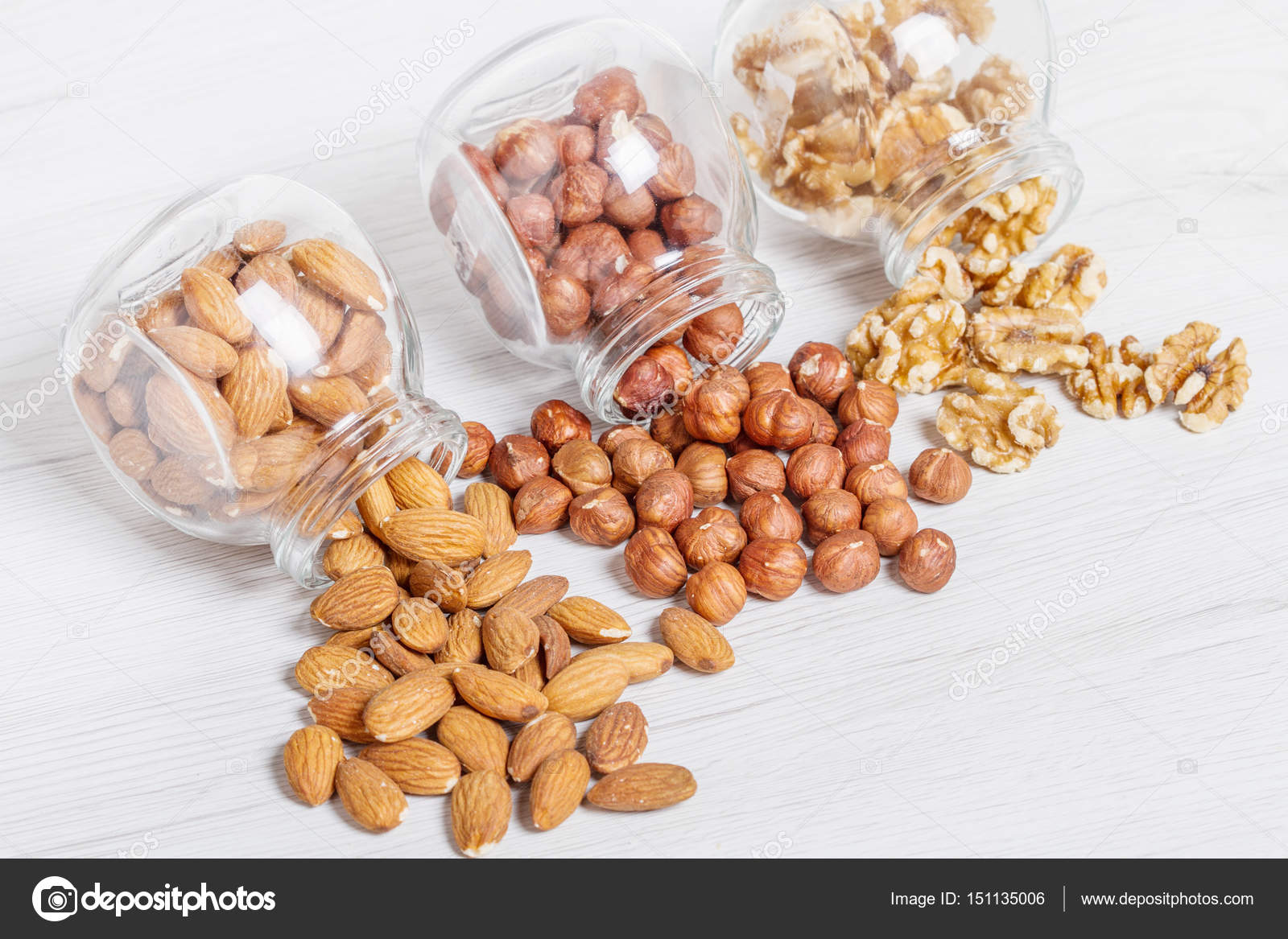 Group of jar with nuts Stock Photo by ©lsantilli 151135006