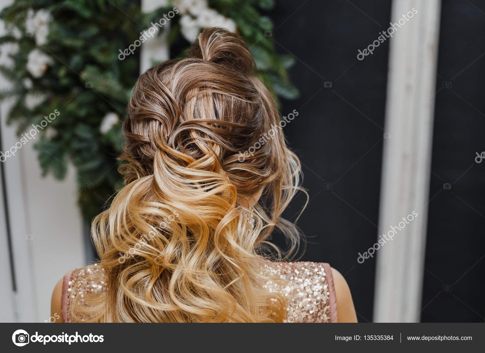 Rear view closeup of a hairdresser masterpiece of wavy and textured ...