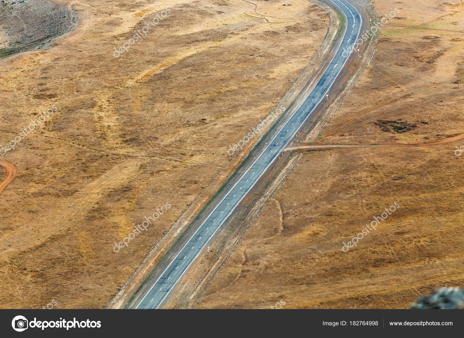 Rural highway road in deserted landscape, aerial bird view Stock Photo ...